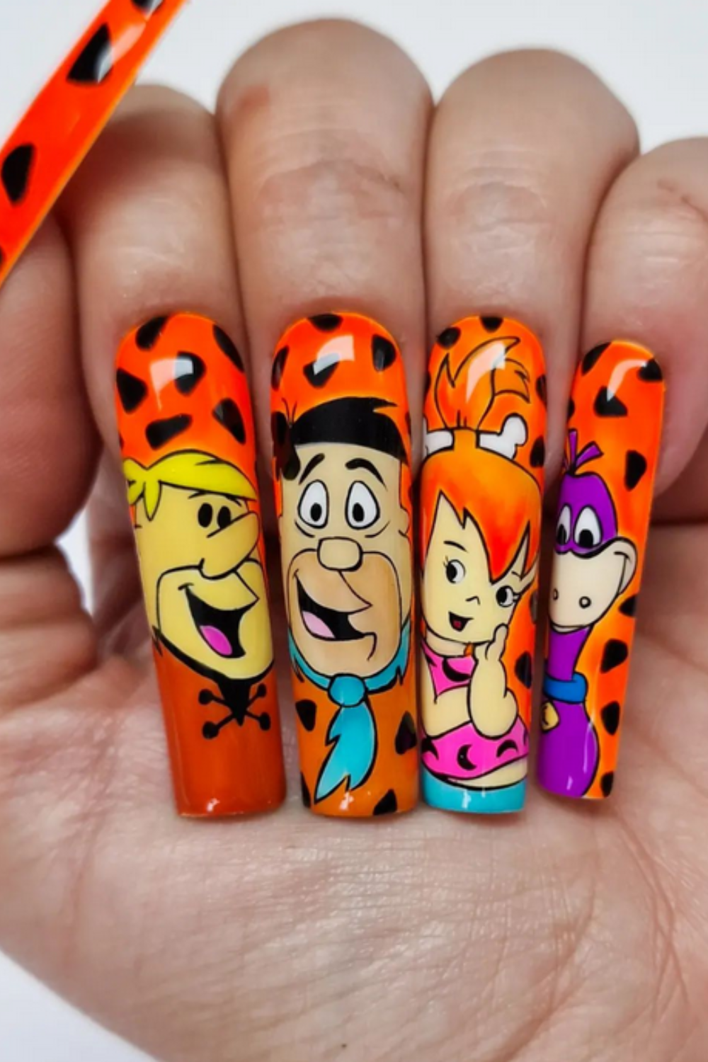 Fun Flintstones nail designs you'll absolutely love - The Beauty Pursuit